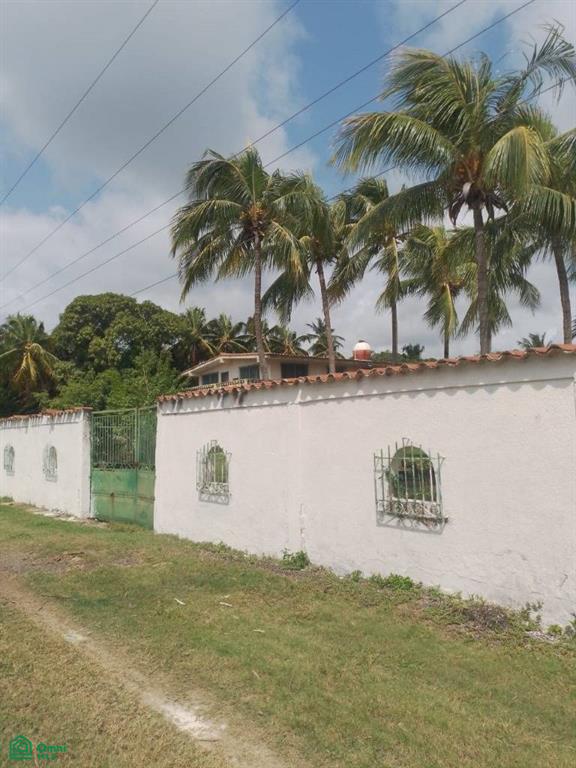Century 21 tucacas sells house with large lot of land - transversal 8 ...